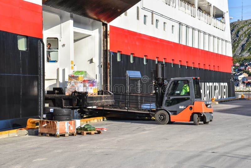 Loading and Unloading of Goods on Hurtigruten Packet Ship Editorial ...