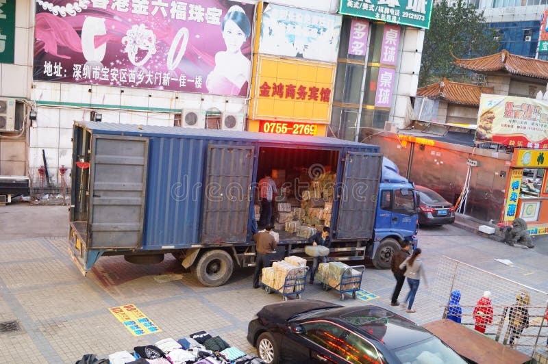 Loading and Unloading Goods in the Truck Editorial Photo - Image of ...