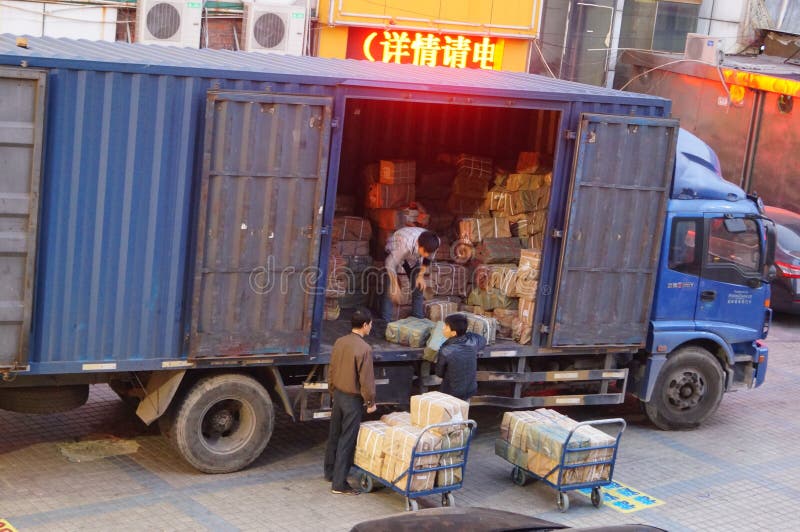 Loading and Unloading Goods in the Truck Editorial Photography - Image ...