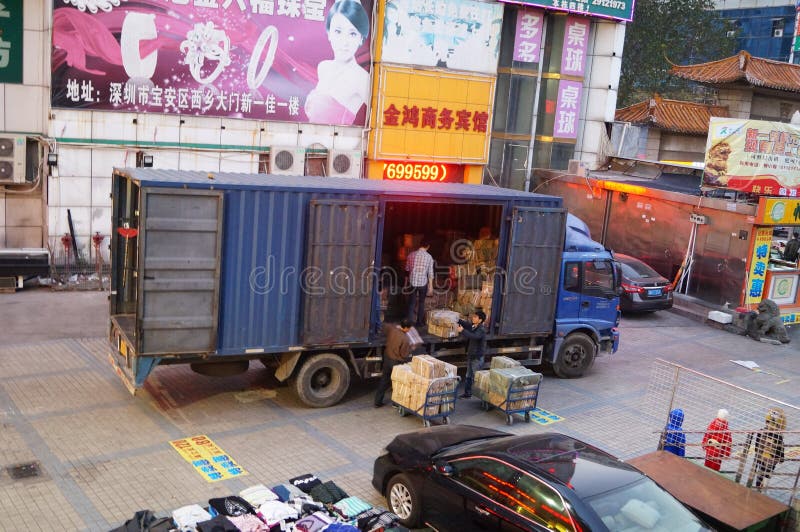 Loading and Unloading Goods in the Truck Editorial Stock Photo - Image ...