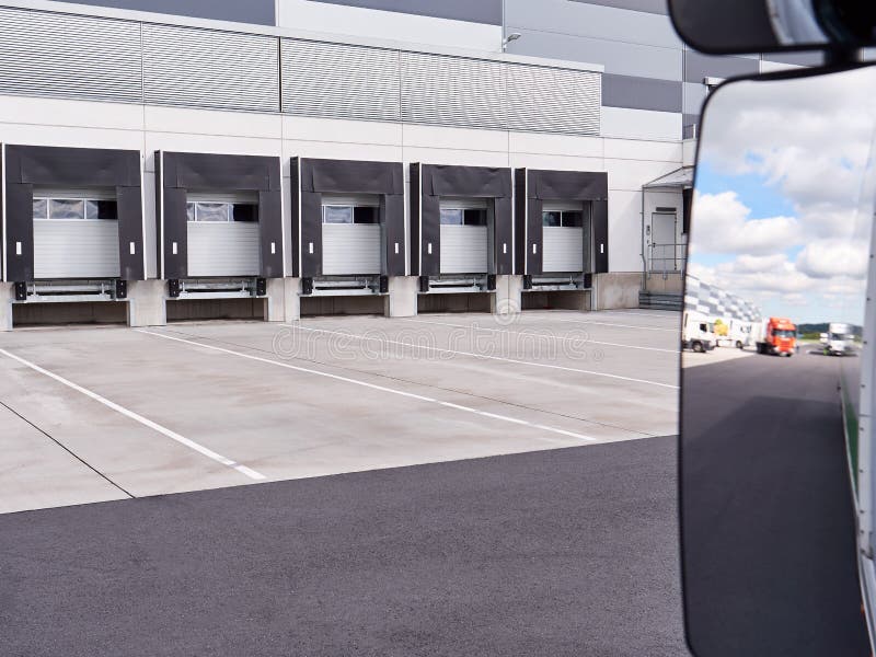 Large Distribution and Logistic Warehouse. Row of Loading Ramps. Stock ...