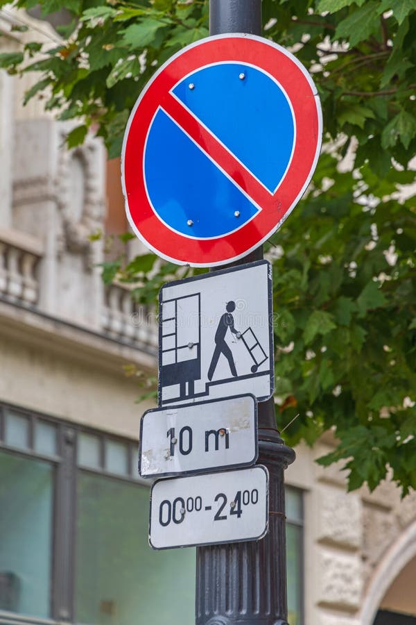 Loading Unloading Sign stock image. Image of capital - 258806155