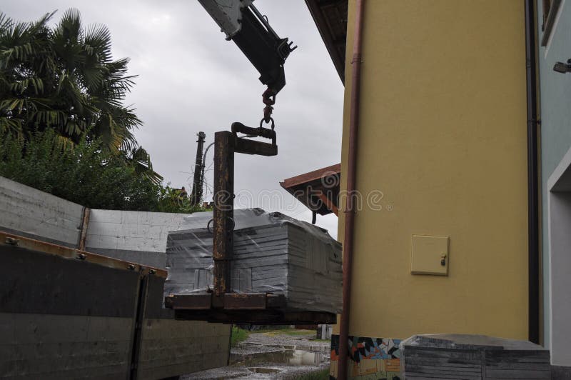 Loading or Unloading of Stone Tiles Stock Image - Image of paving, rock ...
