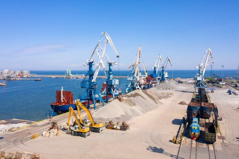 Loading and Unloading of Vessels Stock Photo - Image of business ...