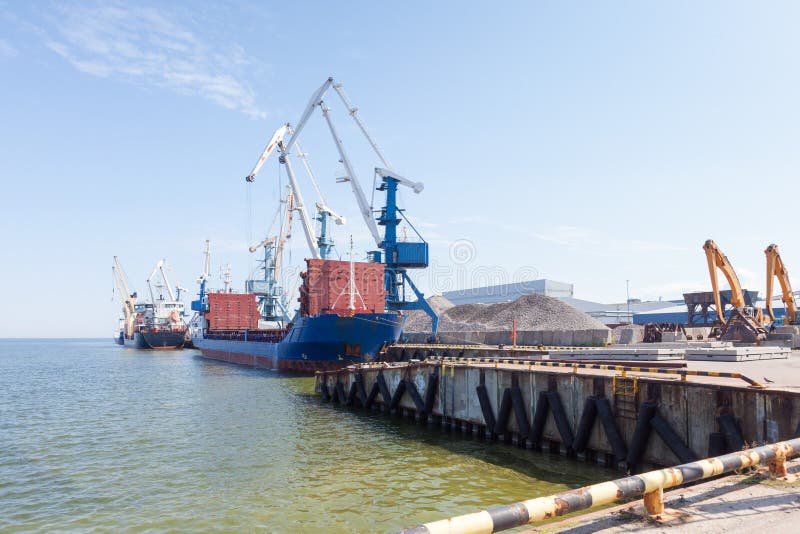 Loading and Unloading of Vessels Stock Photo - Image of ship ...