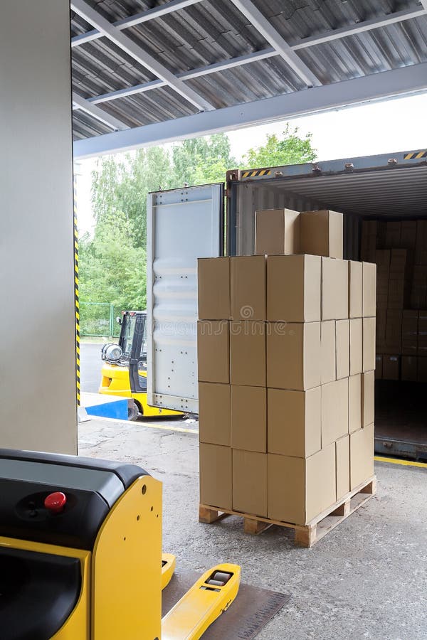 Loading in a warehouse stock image. Image of container - 35101725