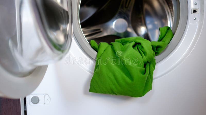 Loading the washer stock image. Image of appliance, laundry - 71188751