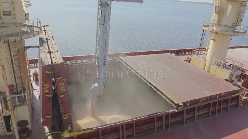 Loading Wheat into a Cargo Ship for Transportation by Sea. the Ship is ...
