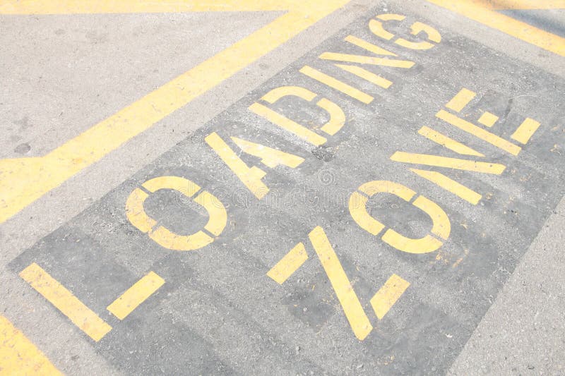 Loading Zone Writing Caption Text Word in Yellow on Black on Pavement ...