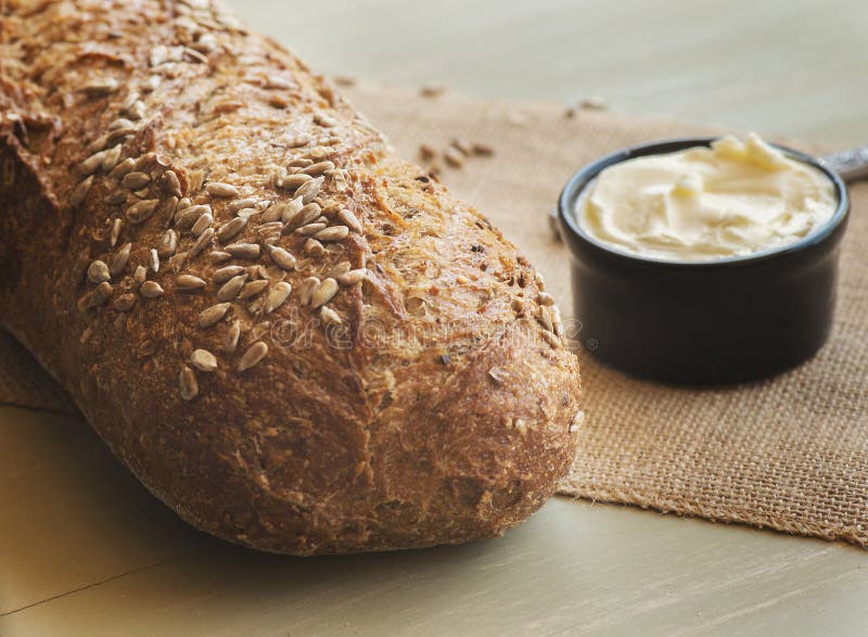 Loaf of bread and butter stock image. Image of rustic - 39536115