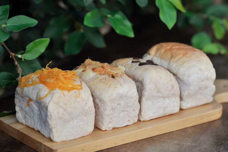 Loaf of Bread, Cheese Bread and Raisin Bread or Bread with Dried Pork ...