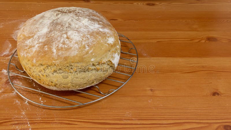 Loaf of Bread Cooling on Wire Rack Stock Photo - Image of loaf, food ...