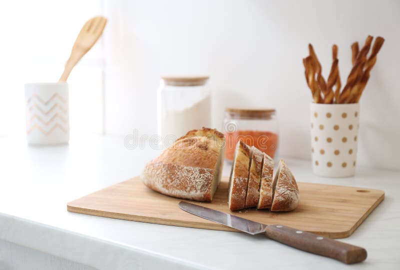 Loaf of Bread on Counter in Kitchen Stock Photo - Image of breadsticks ...
