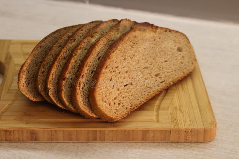Loaf of Bread, Cut into Slices, Fresh Bread. Stock Image - Image of ...