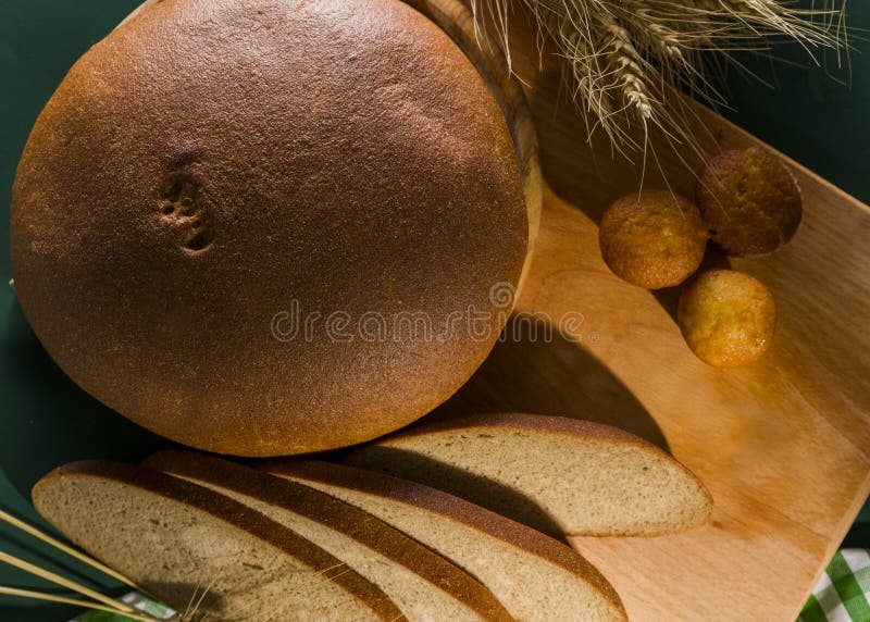 Loaf of Bread with Sliced Bread, Top View Stock Photo - Image of flour ...
