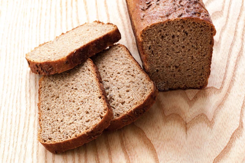 Loaf of Bread on Wooden Table. Top View Stock Image - Image of bread ...