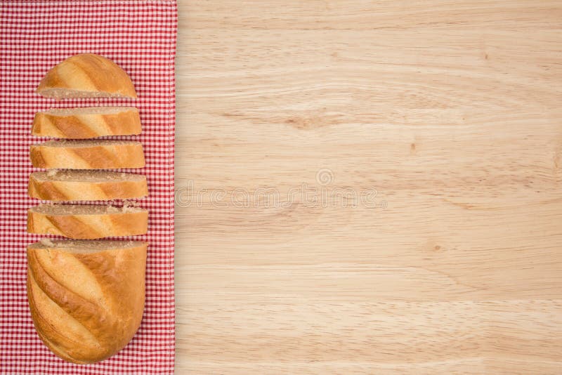 Loaf of Bread on a Wooden Table. Stock Photo - Image of cereal, loaf ...