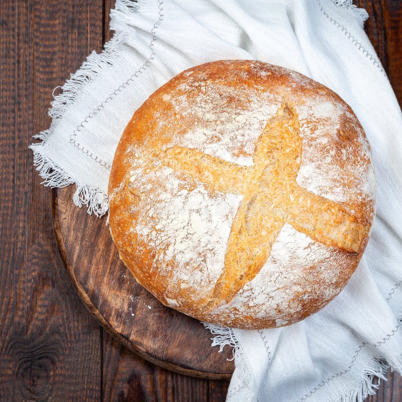 Loaf of Classic Boule Bread on Dark Wooden Board with White Cloth ...