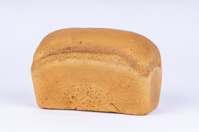 A Loaf of Fresh Wheat Bread on a White Background Stock Photo - Image ...