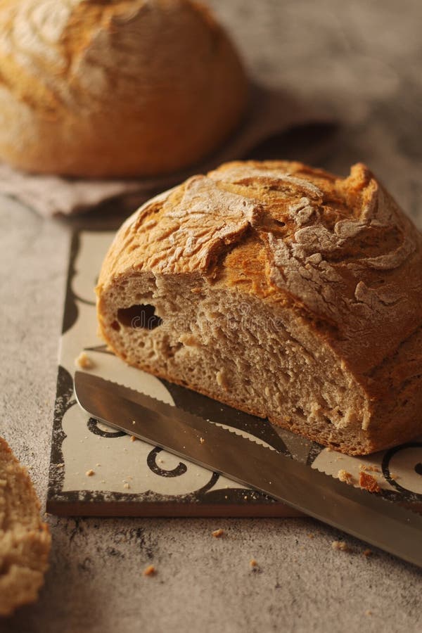 A Loaf of Rye Bread in Rustic Style Stock Photo - Image of loaf, wood ...