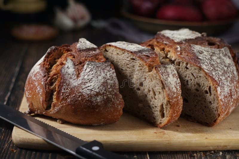 A Loaf of Rye Bread in Rustic Style Stock Photo - Image of loaf, wood ...