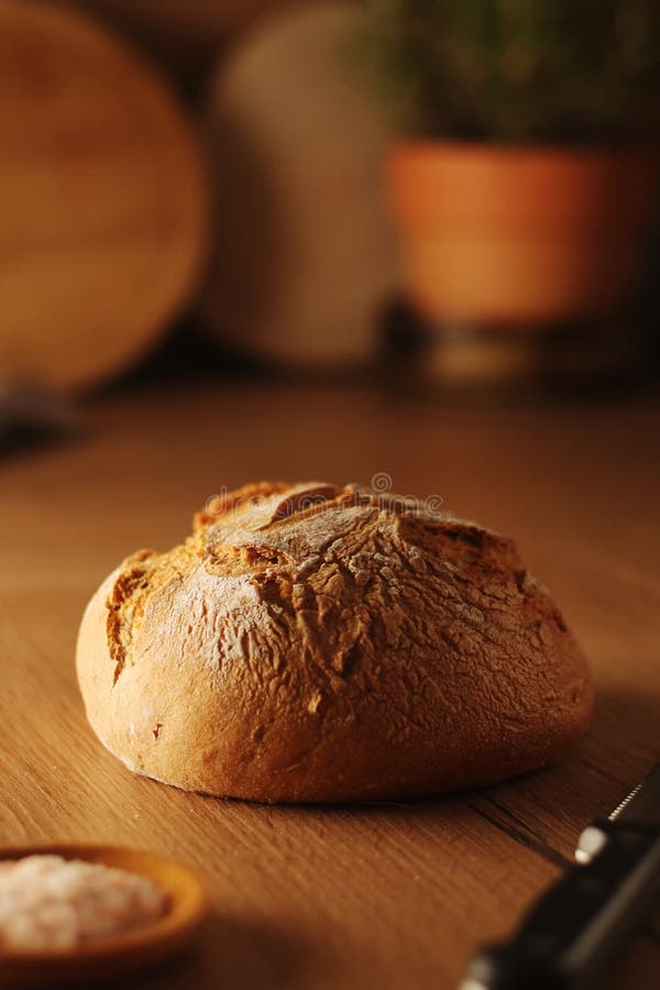 A Loaf of Rye Bread in Rustic Style Stock Photo - Image of loaf, wood ...
