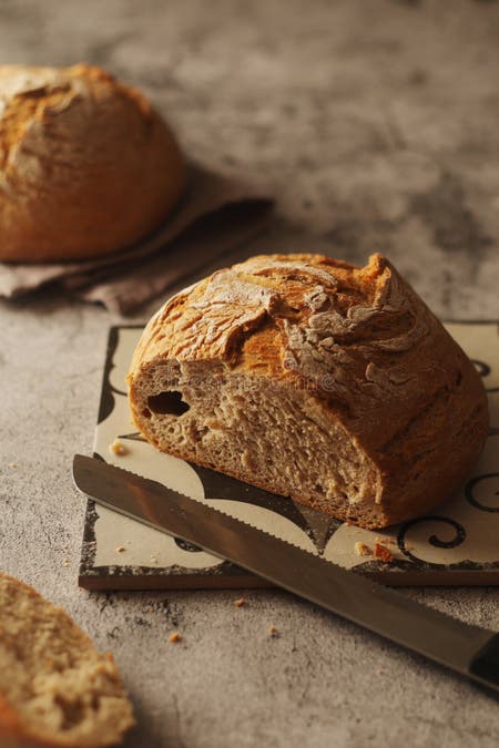 A Loaf of Rye Bread in Rustic Style Stock Photo - Image of loaf, wood ...