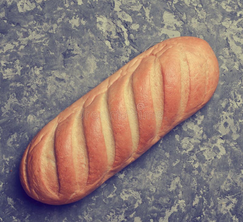 A Loaf of Wheat Bread on a Concrete Table. Top View Stock Image - Image ...