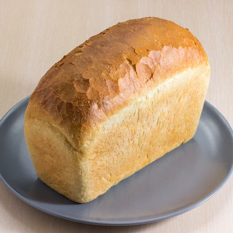 Loaf of White Bread in the Form of a Brick on a Large Plate Stock Image ...