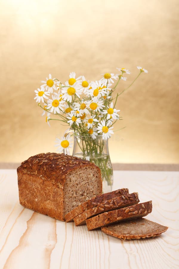 Loaf with wild flowers stock photo. Image of cereal, food - 26169366