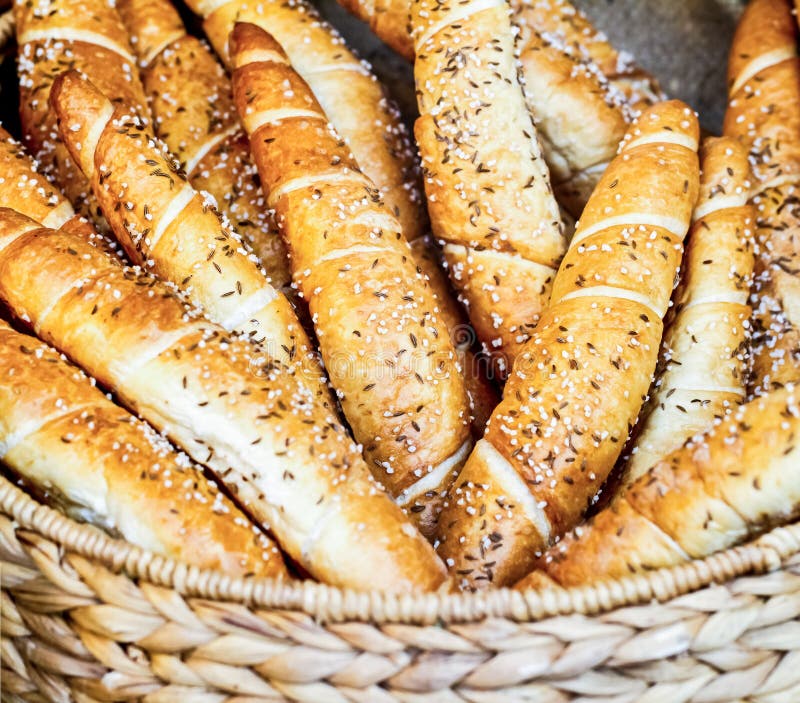 Loaves of Bread in Basket stock image. Image of seeded - 305884175
