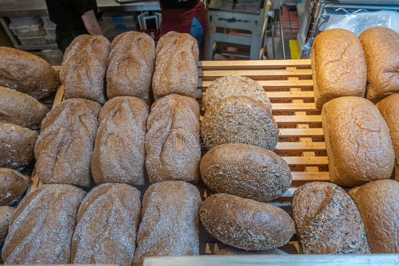 Loaves of Bread on Display in Bakery Stock Photo - Image of wholegrain ...