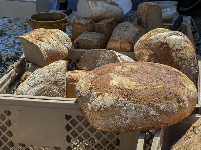 Loaves of Bread Lying in Plastic Crates Ready To Be Cut, Tasted and ...