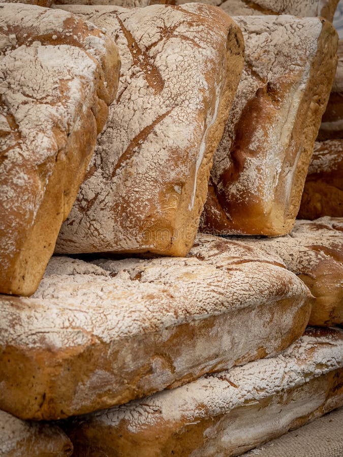 Loaves of a Fresh Artisan Bread. Stock Photo - Image of household ...