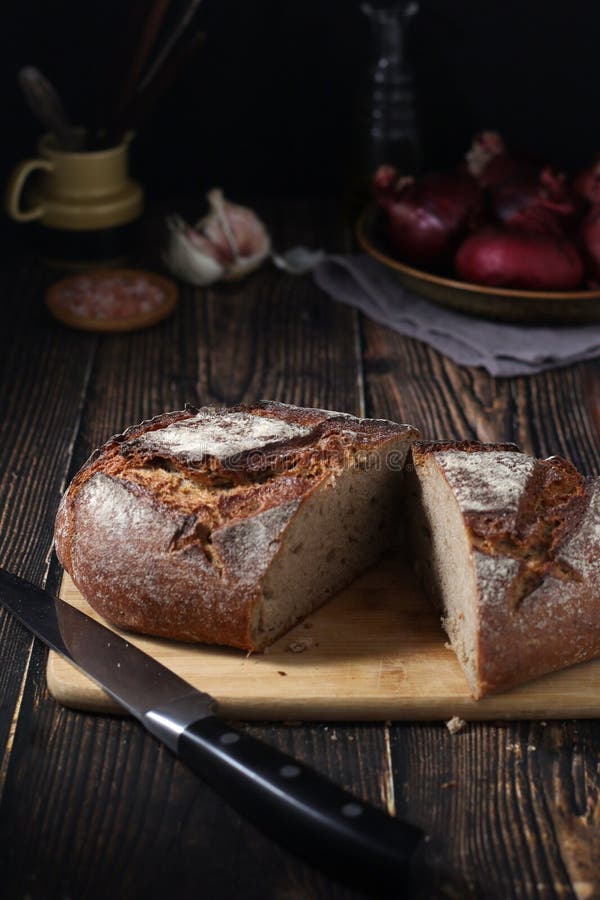 A Loaf of Rye Bread in Rustic Style Stock Photo - Image of loaf, wood ...