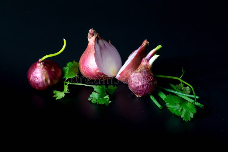 Lobes of a Lime with a Mint Branch on a Black Background Stock Image ...