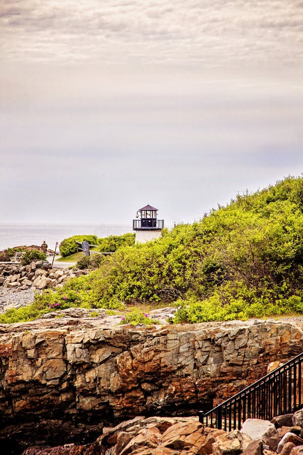 Lobster Point Lighthouse Along the Rocky Coast of Maine on the Marginal ...