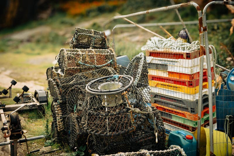 Lobster pots on a quayside editorial image. Image of traps - 344757125