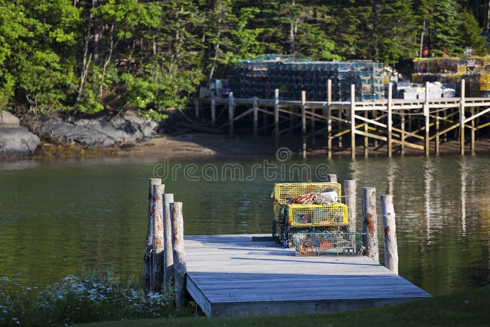 Lobster Traps Stacked on Dock Stock Image - Image of fishing, lobster ...
