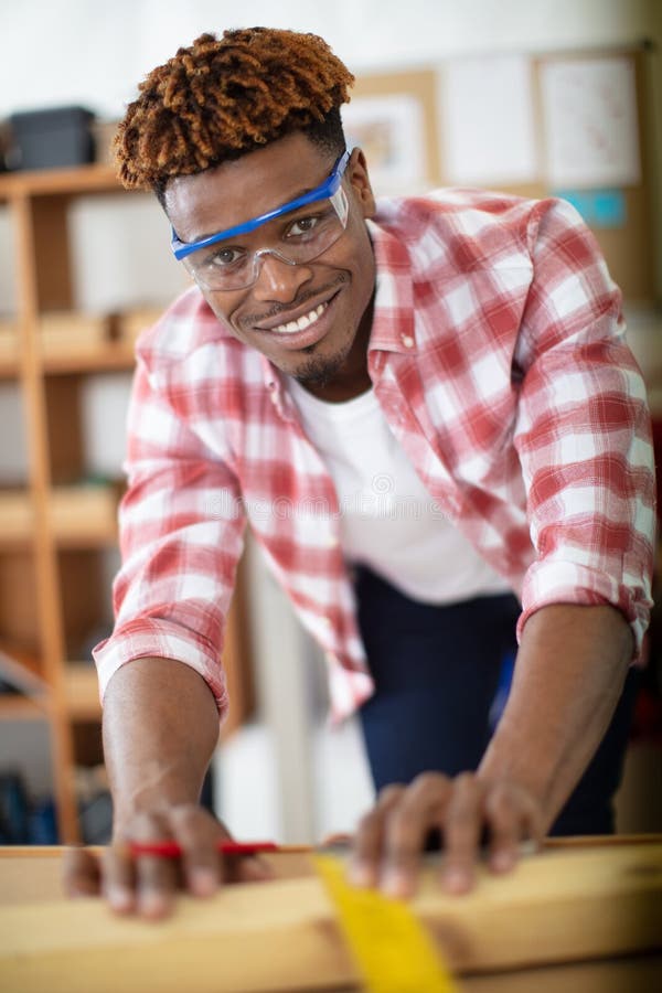 Local African Carpenter at Work Smiling Stock Image - Image of cheerful ...