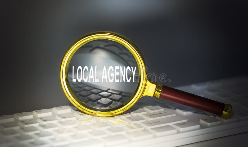 LOCAL AGENCY Word Concept on a Magnifier on the Keyboard Stock Image ...