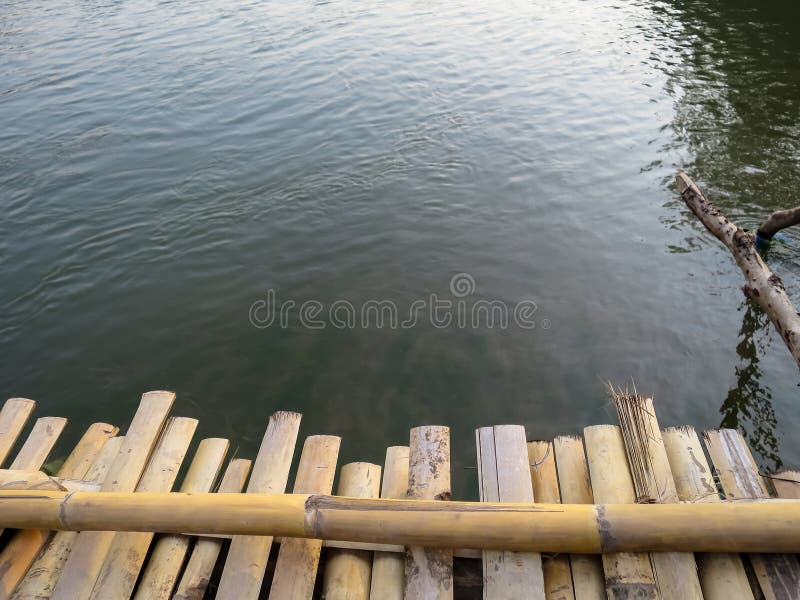 Local Bamboo Bridge Foreground Over the River Stock Photo - Image of ...