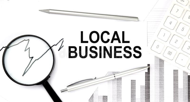 LOCAL BUSINESS Text on Document with Pen,graph and Magnifier,calculator ...
