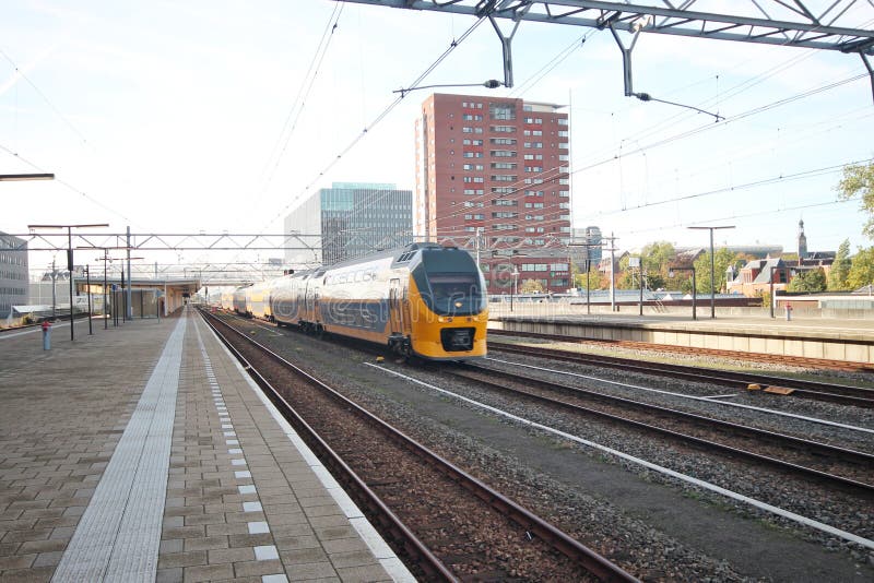 Local Double Decker Intercity Train on the Railway Station of Leiden in ...