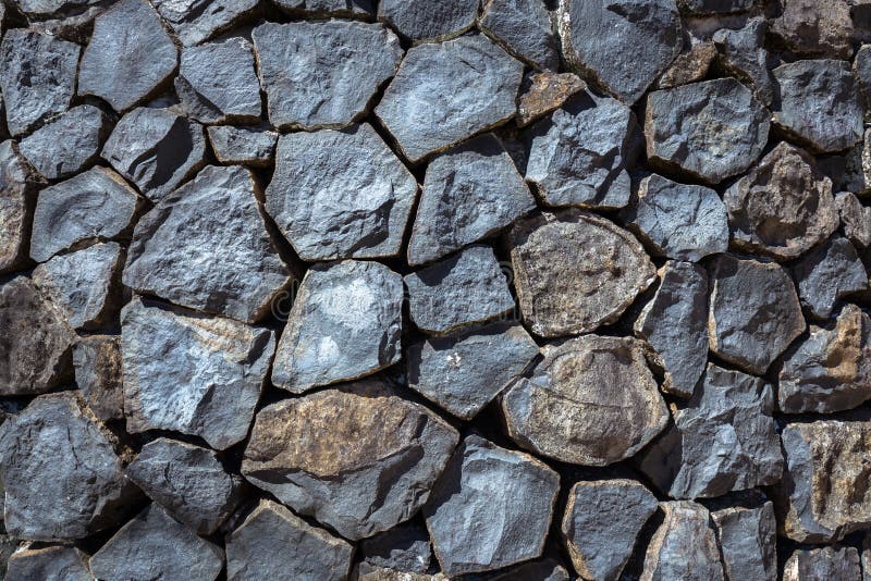 Walls piled up by rocks stock photo. Image of home, textured - 90260344