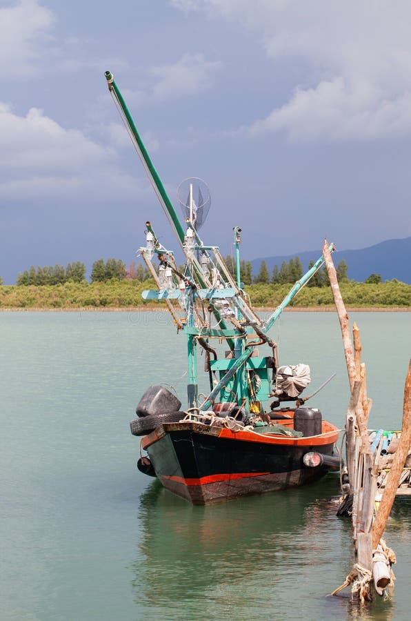 Local Fishing Boat at the Dock Stock Photo - Image of wood, beach: 48164322