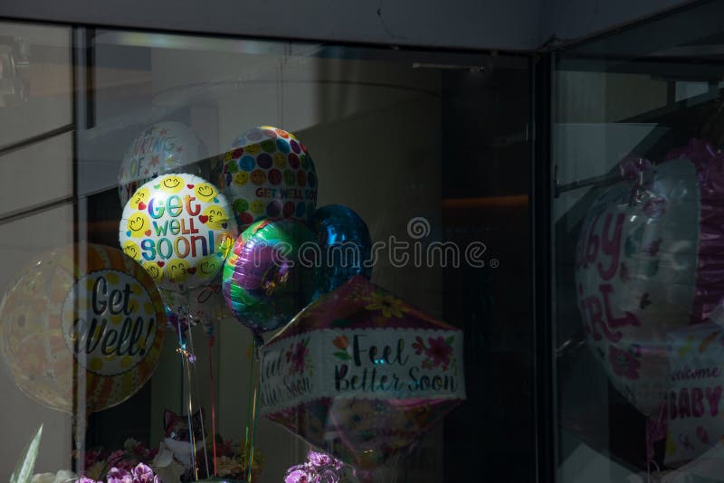 Local Gift Store Facade with Celebration Balloons Display. Stock Photo ...