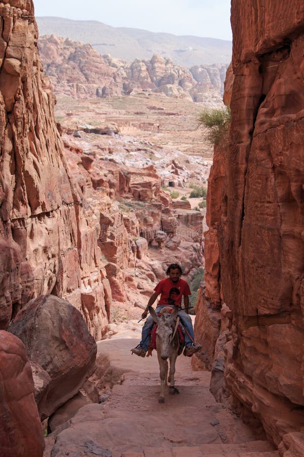 Local Jordanin Guide Exploring the Ruins of Ancient Petra, Jordan ...