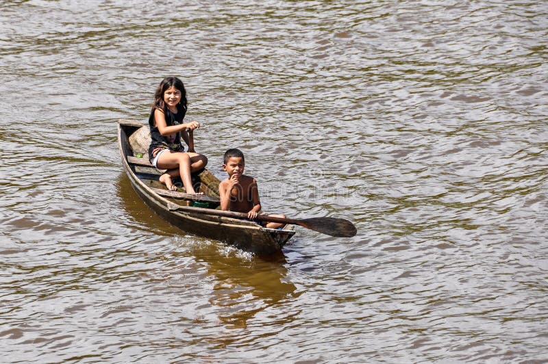 Local Kids in a Boat on the Amazon River, Brazil Editorial Photography ...