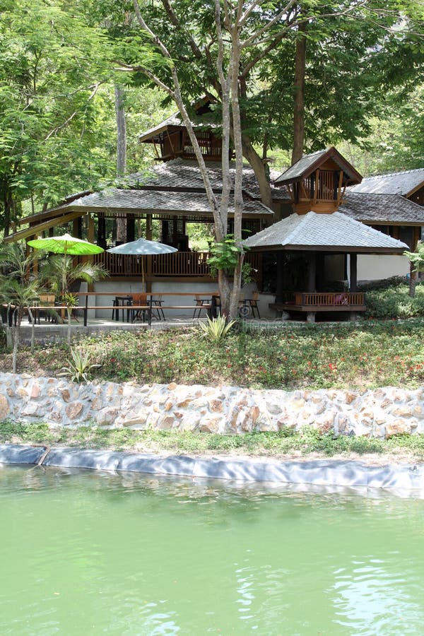 Wooden Restaurant on Green Grass Stock Image - Image of decor, estate ...